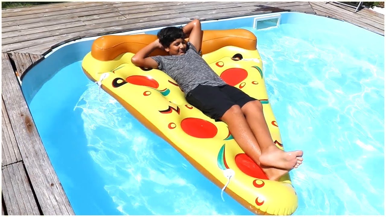 Sami Adel Pretend play with a giant inflatable pizza in Swimming Pool, funny videos for kids