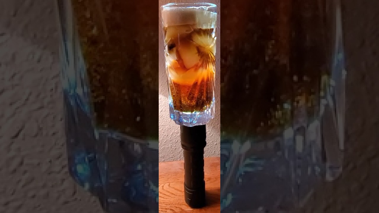 Illuminating A Glass of Coca-Cola