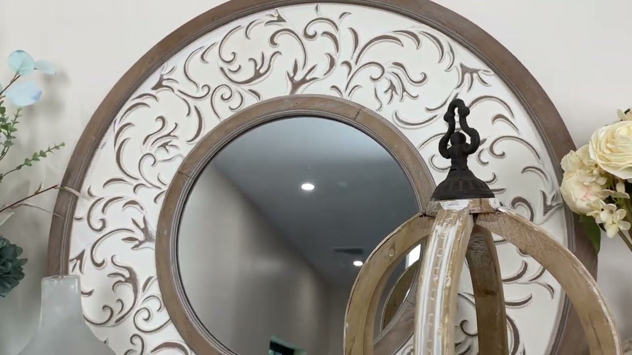 31.5” Round Natural & Whitewashed Embossed Scroll Framed Wall Mirror
