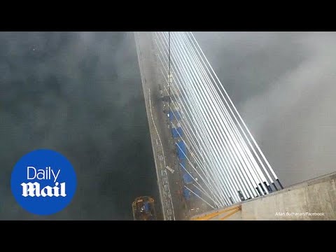 Crane operator "films himself at work" on UK's highest bridge - Daily Mail
