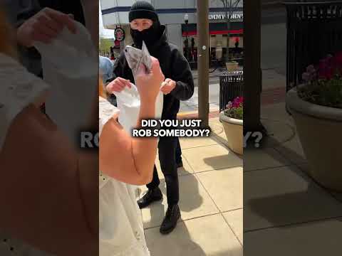 PRETENDING TO ROB A BANK IN PUBLIC