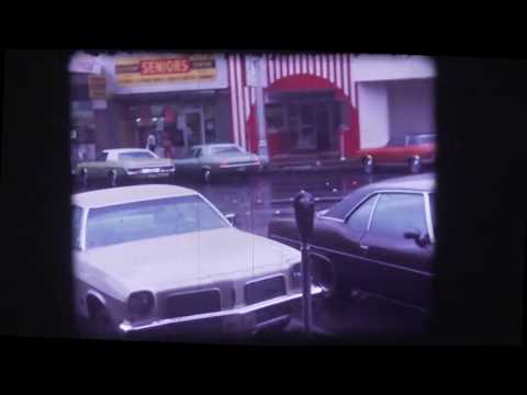 People walking downtown in the rain | Austin, TX 1972