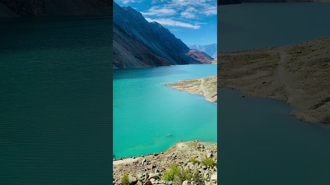 Crystal Clear: A Mountain Lake Paradise Nature's Mirror: Mountains Reflected in Still Waters