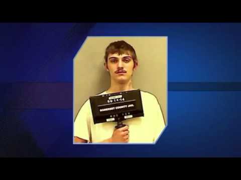 Bobby Burt jail Mugshot printed on his t-shirt