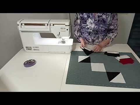 Churn dash / Monkey wrench quilt block.