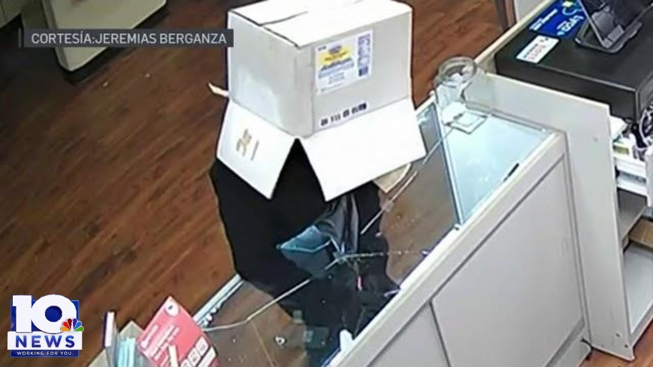 Thief sports cardboard box to rob phone repair shop