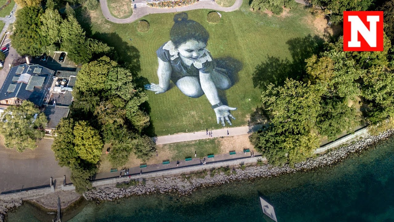 This Giant Land Painting At Lake Geneva Symbolizes Hope For Refugees