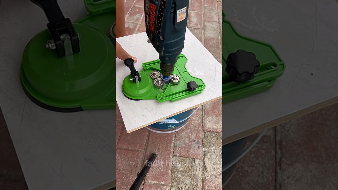 Tile cutouts, using this suction cup locator by Fault House
