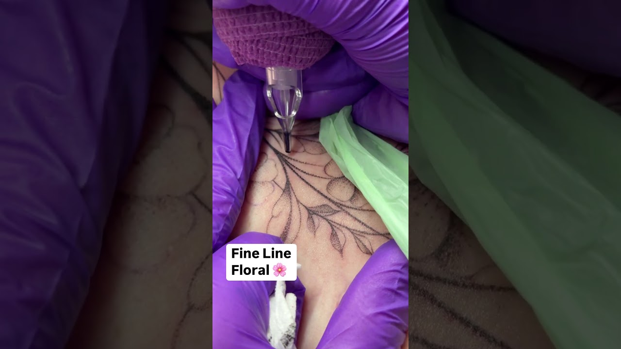 Flower fine line tattoo