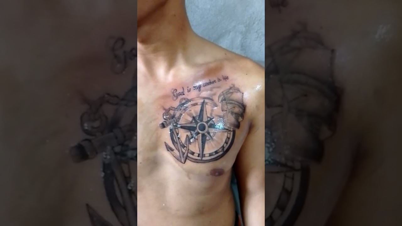 compass tattoo in chest