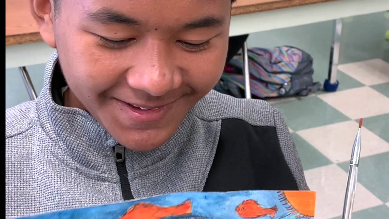 Self-portraits by WSD middle school students.