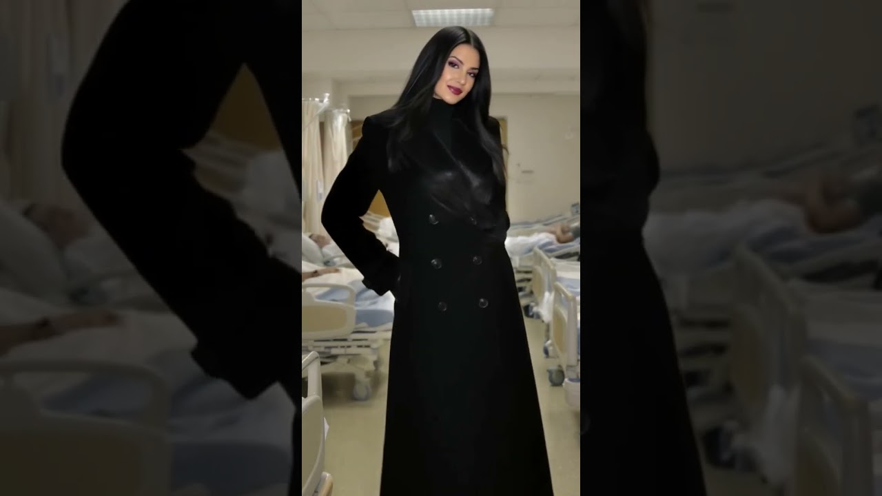 sadistic doctor in leather gloves controls patients with a device