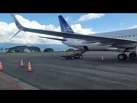 Boarding the rear of the plane on the tarmac in Armenia Colombia to return home.