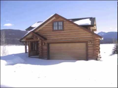 Log cabin is going to be sanded and prepared for staining in Steamboat Springs, Colorado
