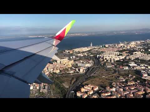 Holidays in Sight: Takeoff from Lisbon with View of Vasco da Gama Bridge