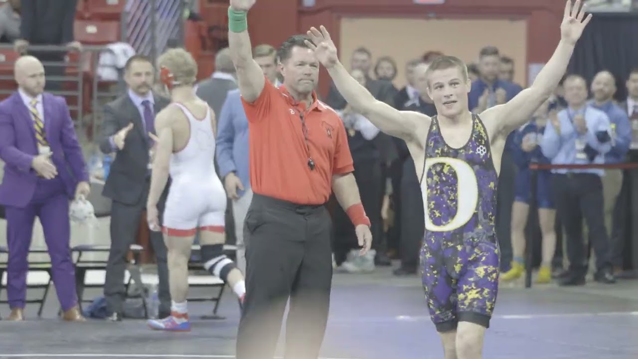Kellen Wolbert celebrates his 4th state title with a bow and a backflip