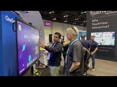 OneScreen CEO Sufian Munir shows off new Guru button on Touchscreen T7 at FETC