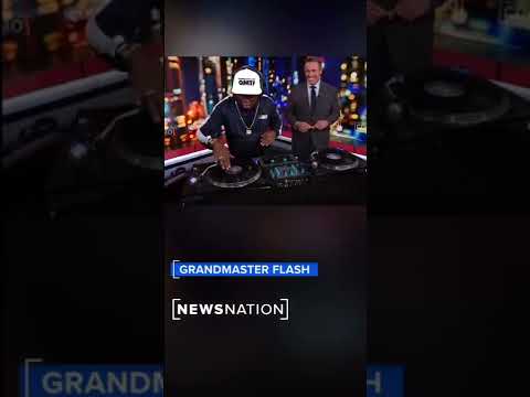 Legendary DJ Grandmaster Flash gives Chris Cuomo a lesson in “scratching”