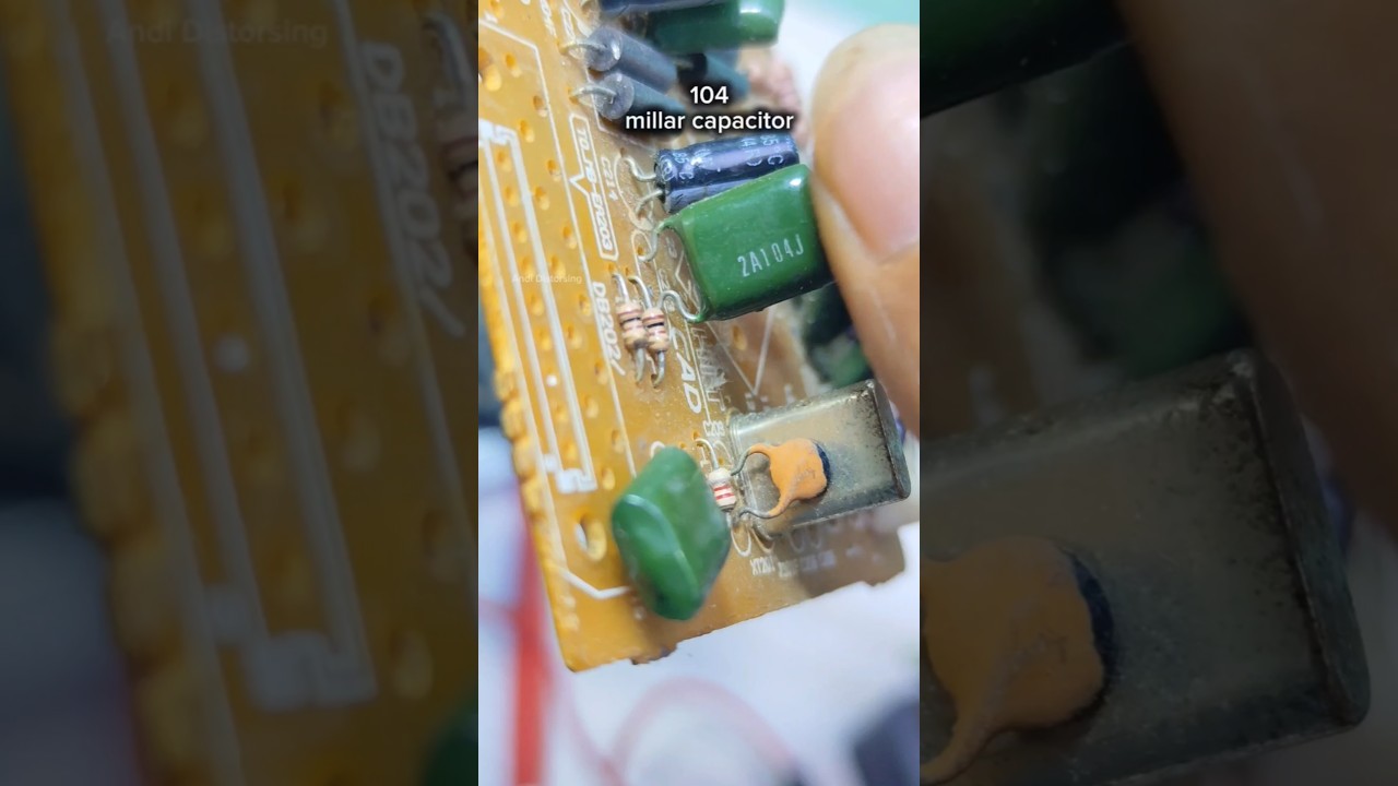 Mylar capacitors with codes on the body, one, zero, four #value #mylar #capacitor #education