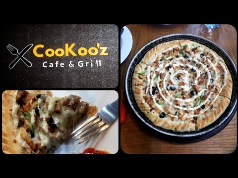 Yummy stuffed Pizza at Cookoo'z Cafe and Grill Vehari City || Life with arham Shehzad
