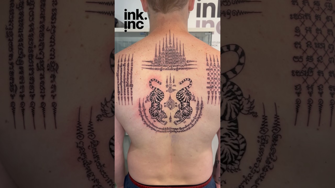 Sak Yant Twin Tiger Tattoo | Traditional Tattoo Ideas for Back. #tattoo #sakyanttattoo