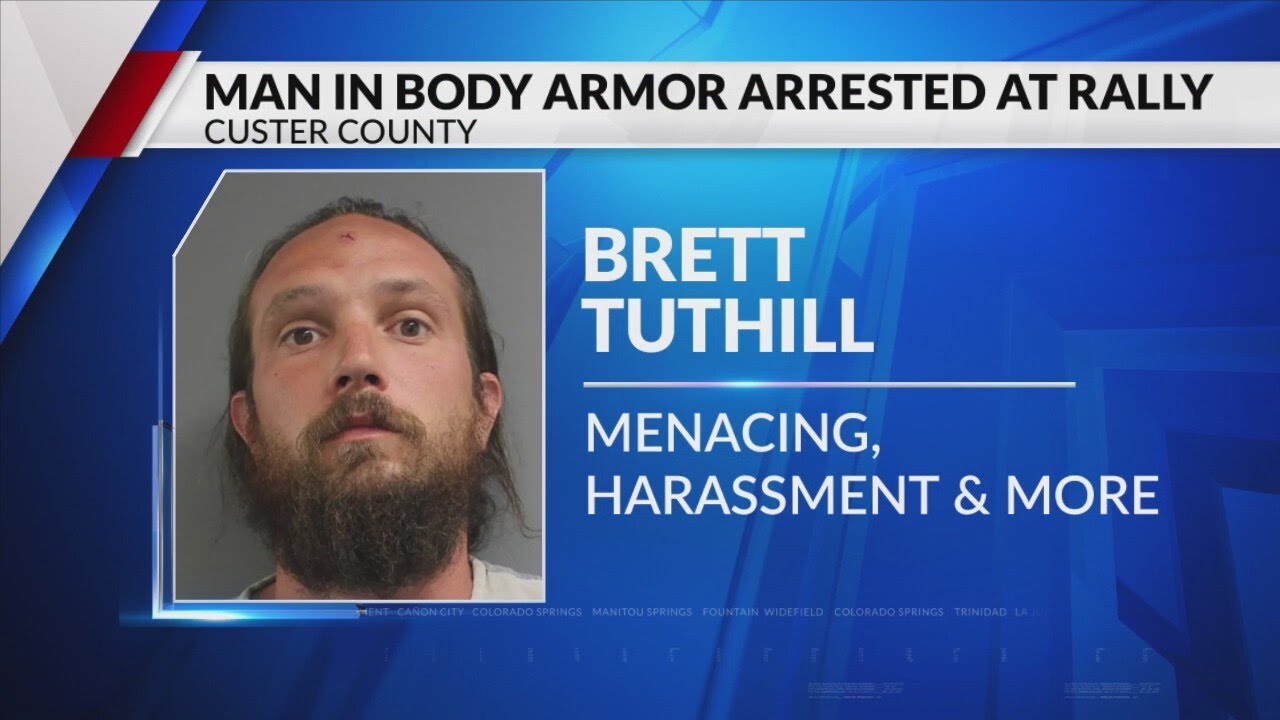 CCSO: Man in body armor arrested, pointed gun at Flag Day rally