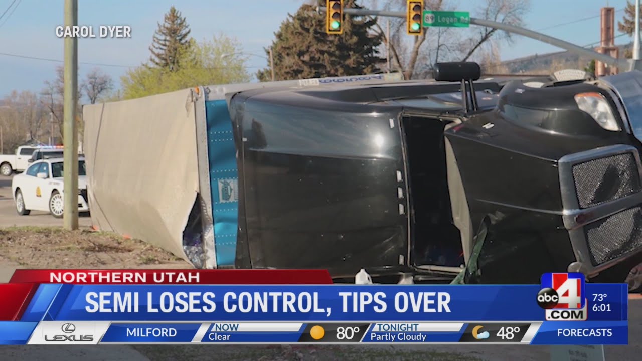 Semi loses brakes, rollsover in Garden City