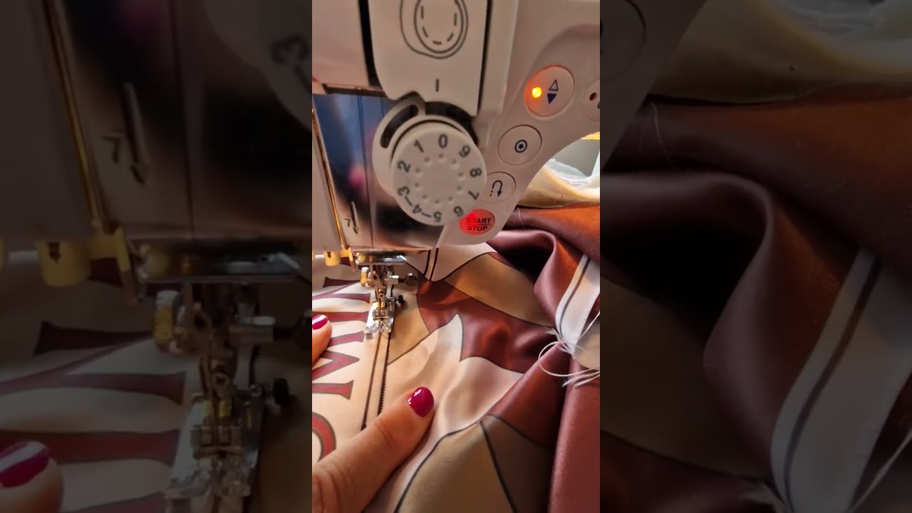 Overstitch applique technique on Duchess satin at the Flag Studio workshop.