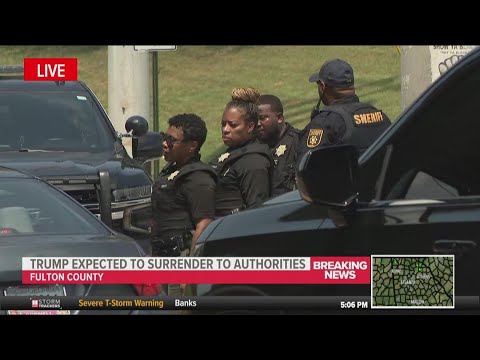 Hundreds gather outside Fulton County Jail, police implement security measures ahead of Trump's arri