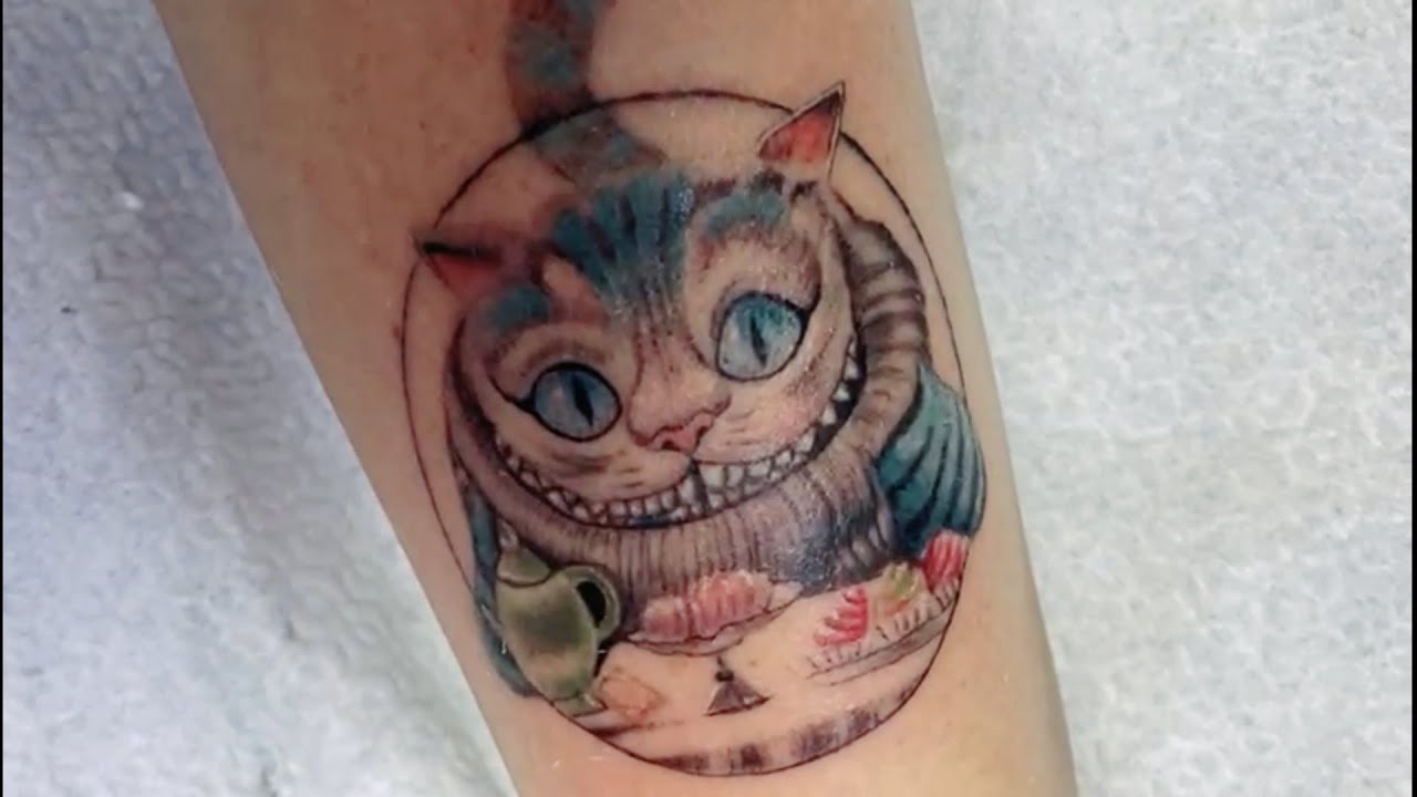 Cheshire cat tattoos from the fairy tale 