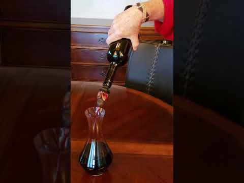 Pouring a Fine Brunello though a chirping bird spout