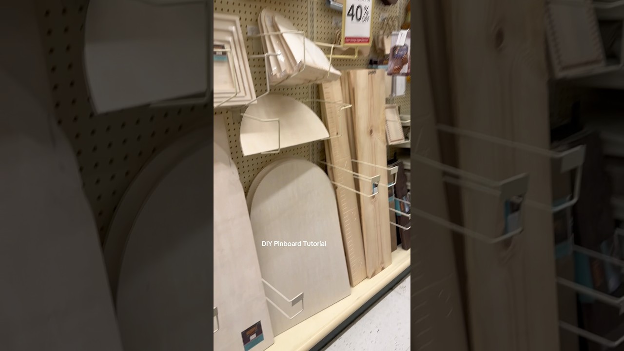 Such a fun and easy DIY to hang up your kid's artwork! #DIY #tutorial #pinboard #artroom artwork