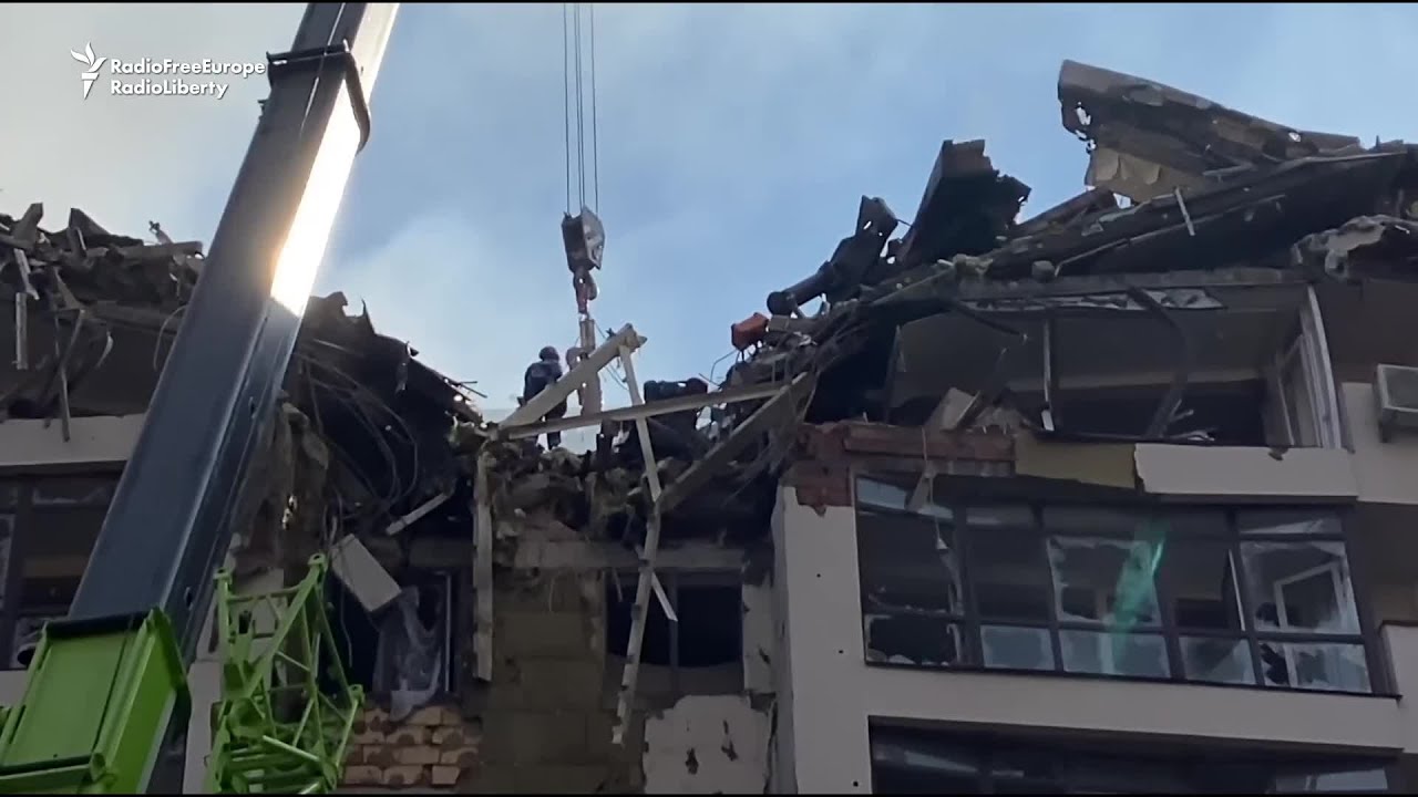 Ukrainian Firefighters Rescue Residents, Clear Rubble As Russian Missiles Hit Housing Area