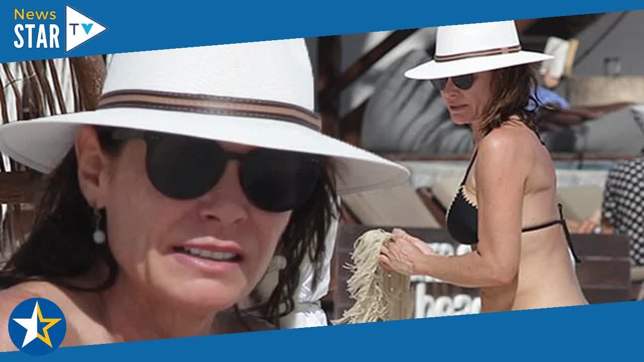 Luann de Lesseps basks in the sun in tiny string bikini as she continues her beach getaway to Tulum