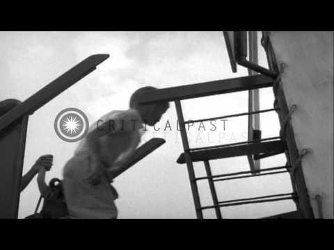 American dependents wave at US Army 1st Division soldiers as troopship leaves Br...HD Stock Footage