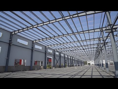 Prefabricated Steel Warehouse Hangar Construction Site - China Steel Structure Manufacturer