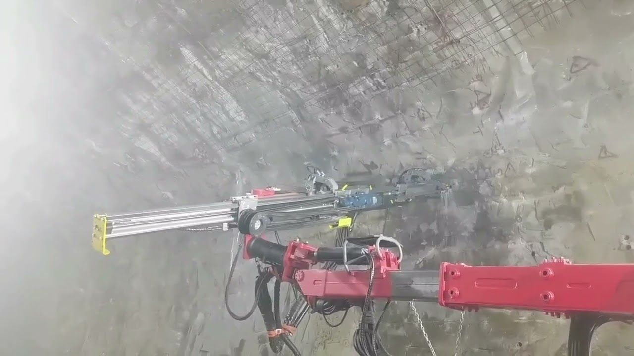 Rock drilling machine with automatic retraction fuction