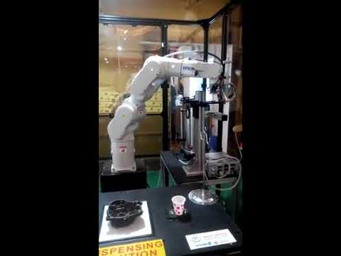 Epson Robot C8 serves drinking water