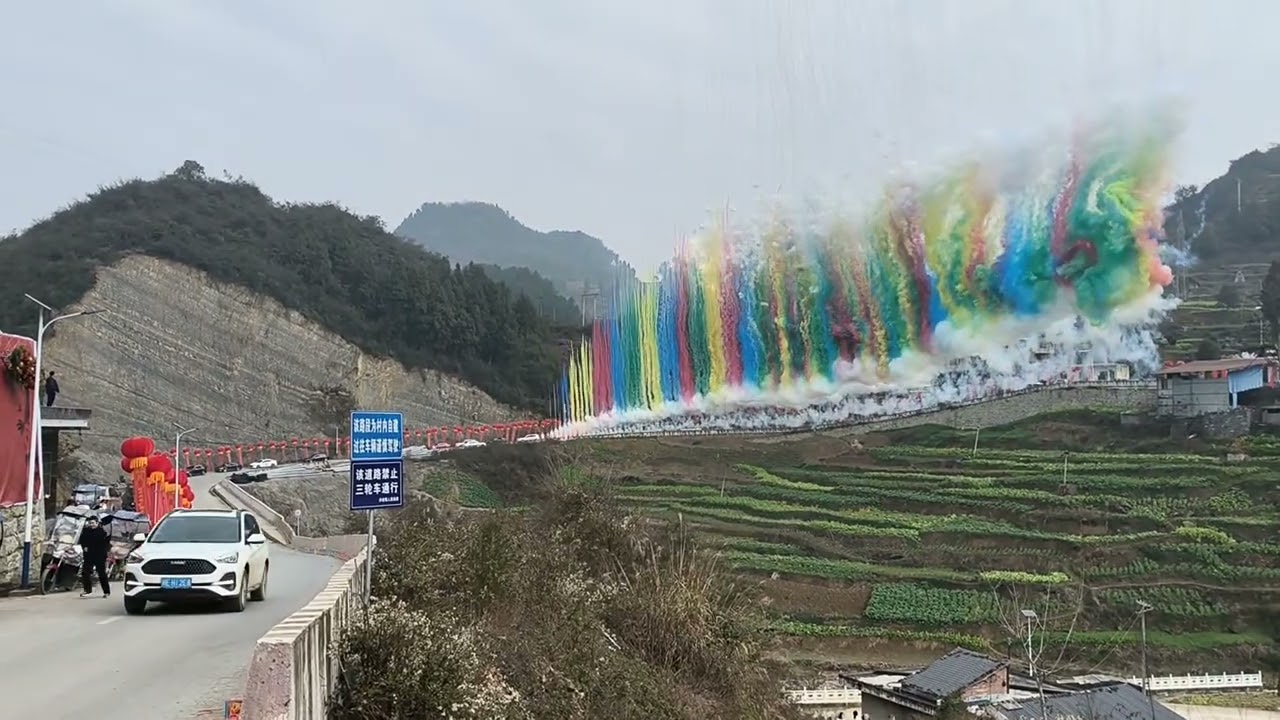 Vibrant daytime fireworks create colorful smoke wall in Sichuan, China