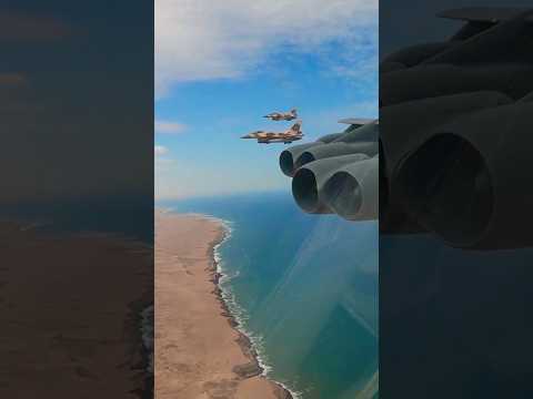 Boeing B-52 escorted by two F-16 Block 50's