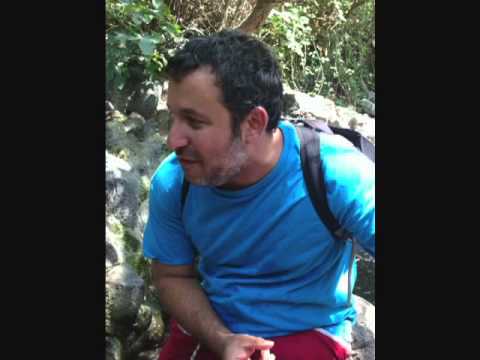 Yeshua feeding the people with five loaves and two fish in Bethsaida