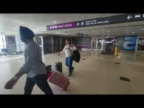 Toronto Pearson Airport from Terminal 1 going to Terminal 3 by free shuttle link train