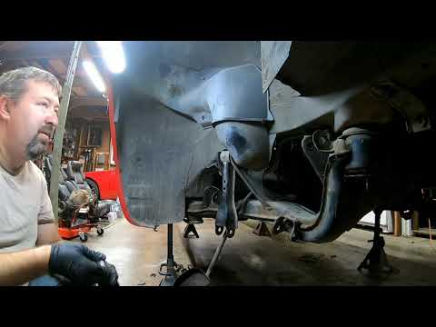 Nissan 300ZX - Part 56 - Parking / emergency braking cable removal and Gas tank fill tube removal