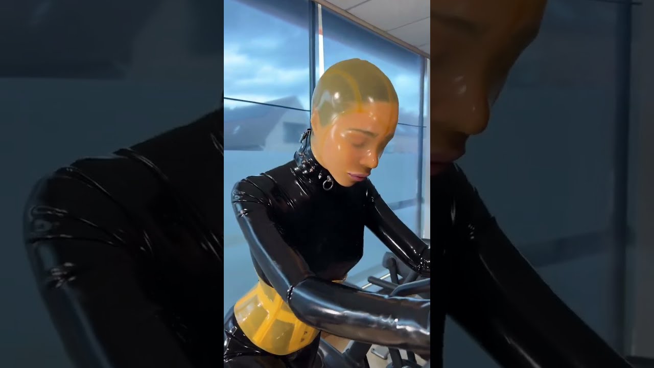 Girl Working out in Latex Mask