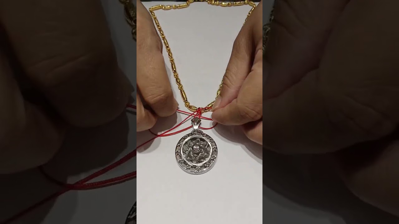 Installing the pendulum necklace. #shorts