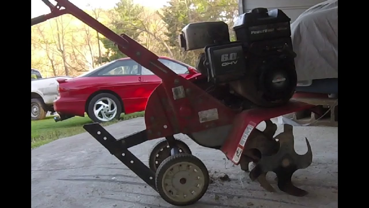 6 H.P. Briggs on a Huskee Tiller hasn't been running in 10 years, plus needs welded! Time to till!