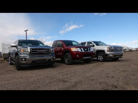 2014 GMC Sierra 5.3L vs Nissan Titan vs Chevy Silverado 6.2L Towing Matchup Test (Part 1)