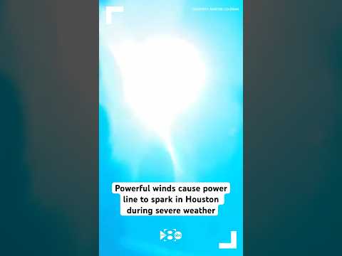 Powerful winds cause power line to spark in Houston