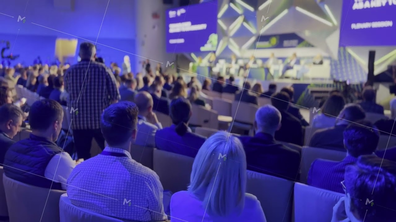 Engaged audience at a futuristic technology conference