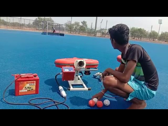 Hockey Ball Machine - Professional Gravity Hockey Ball Machine ...